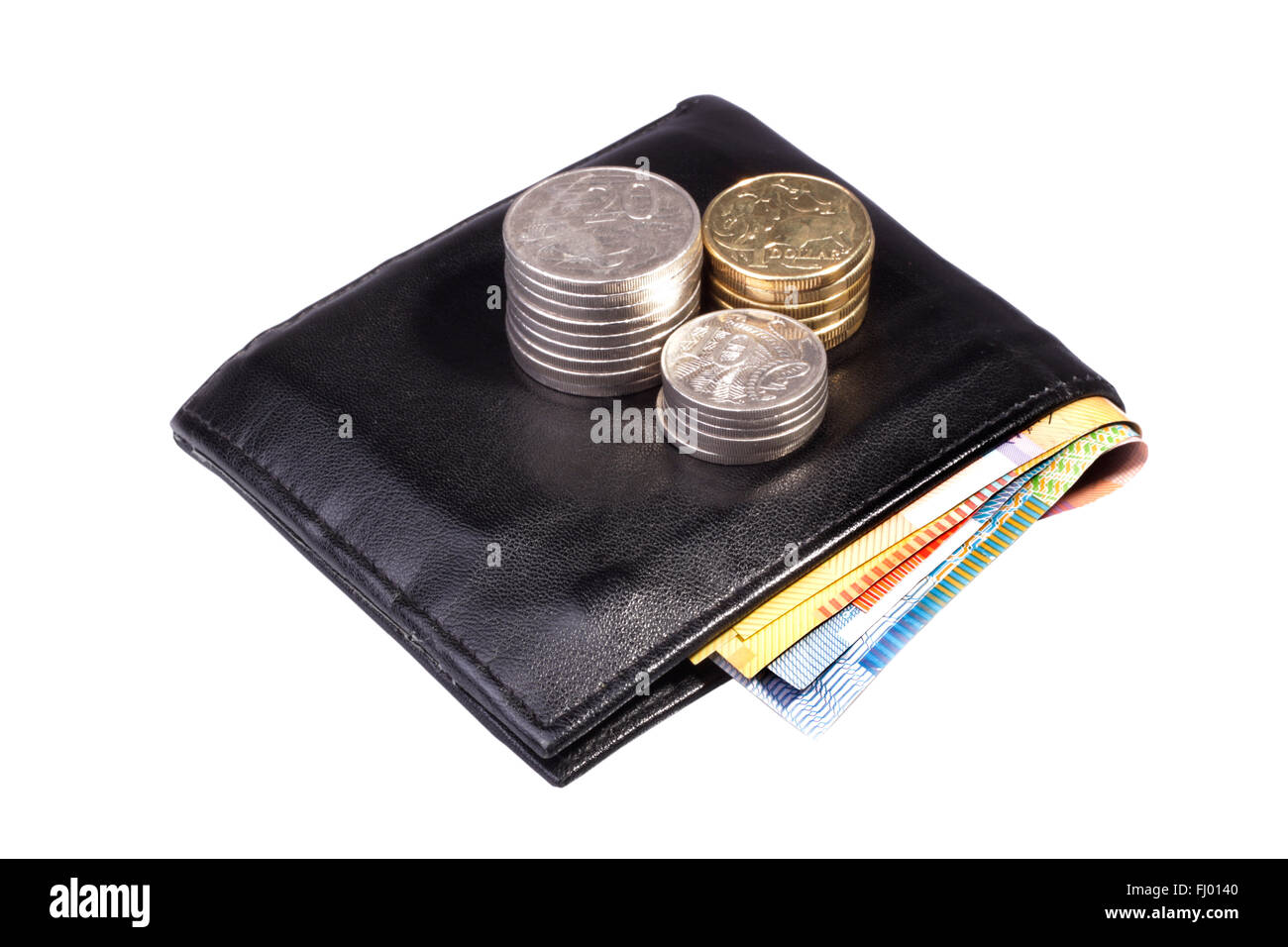 Stack of Australian coins on a black wallet isolated on white ...