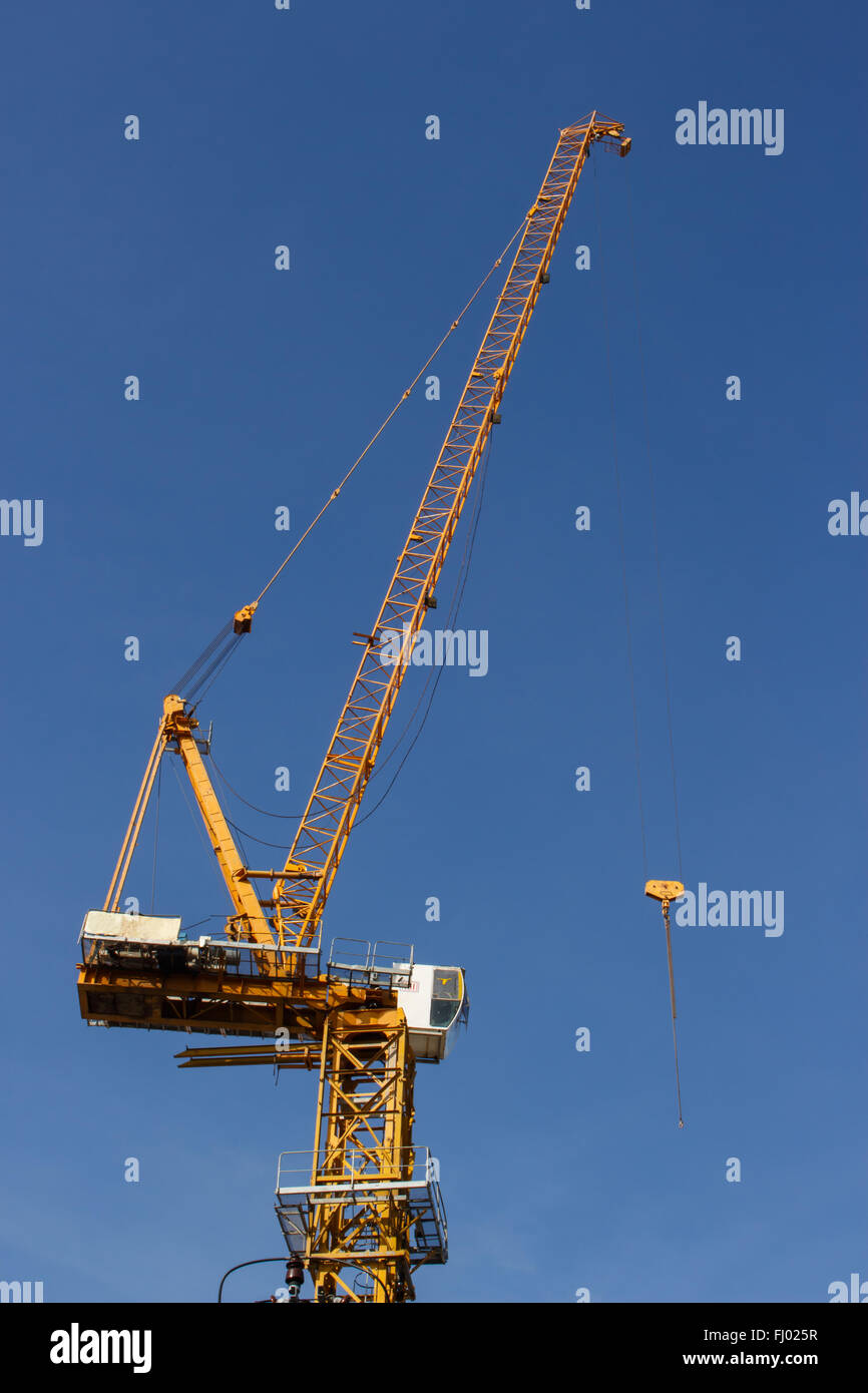 yellow construction cranes working outdoor Stock Photo - Alamy
