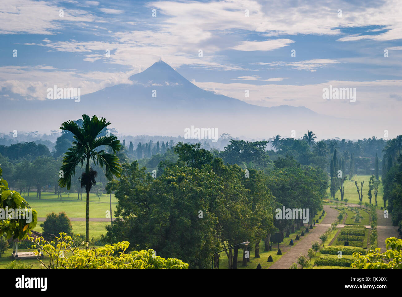 Merapi volcano as seen from the ancient buddhist temple of Borobudur in ...