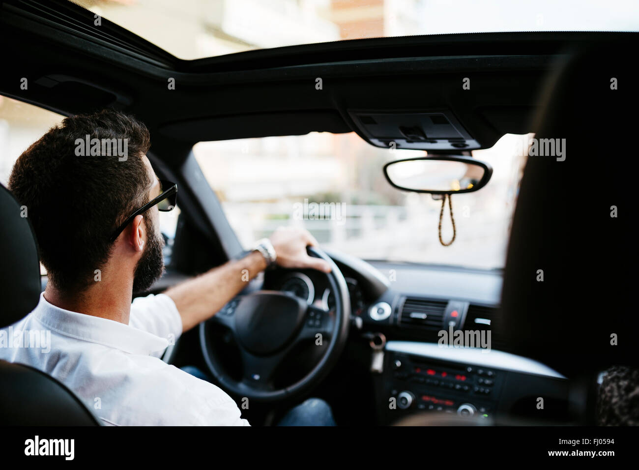 Driving a car and over the shoulder hi-res stock photography and images ...