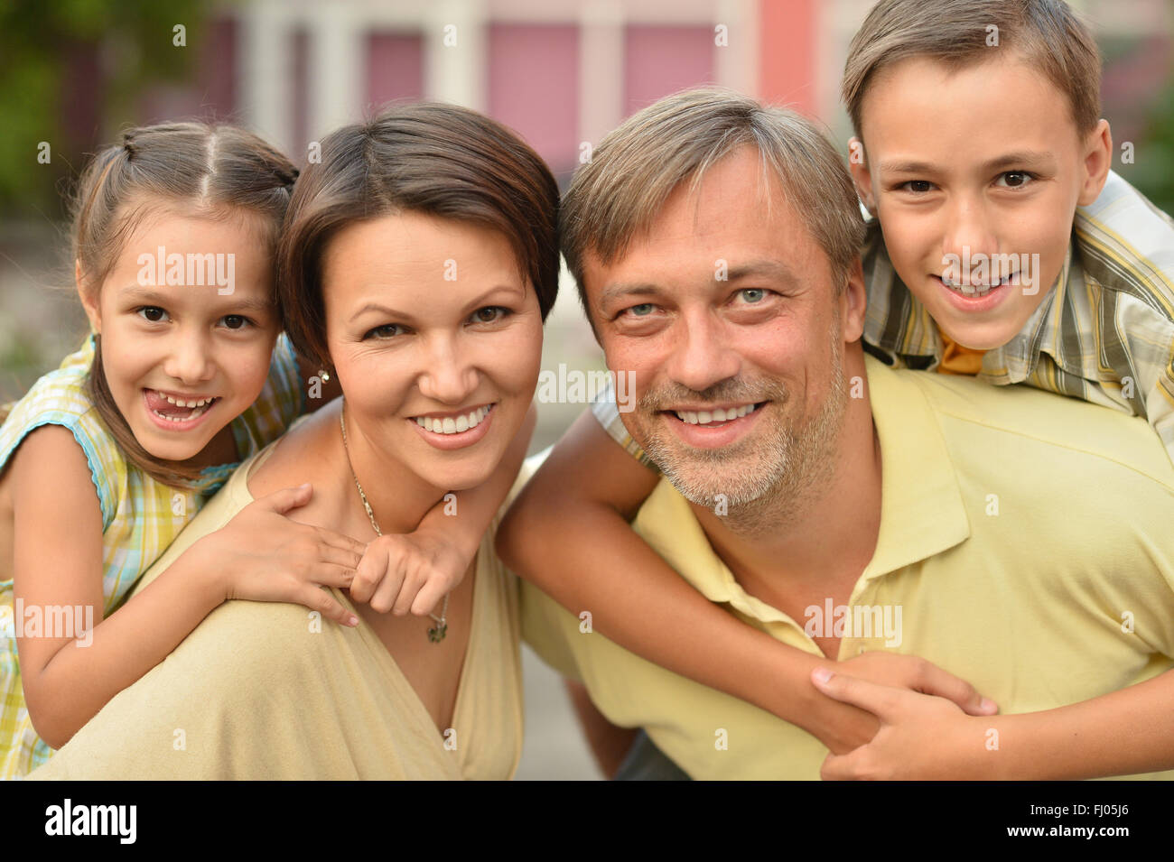Family resting in summer park Stock Photo - Alamy