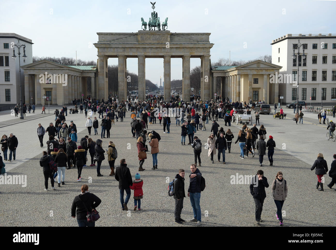 Berlin, Germany. 27th Feb, 2016. People gather around the Brandenburg ...