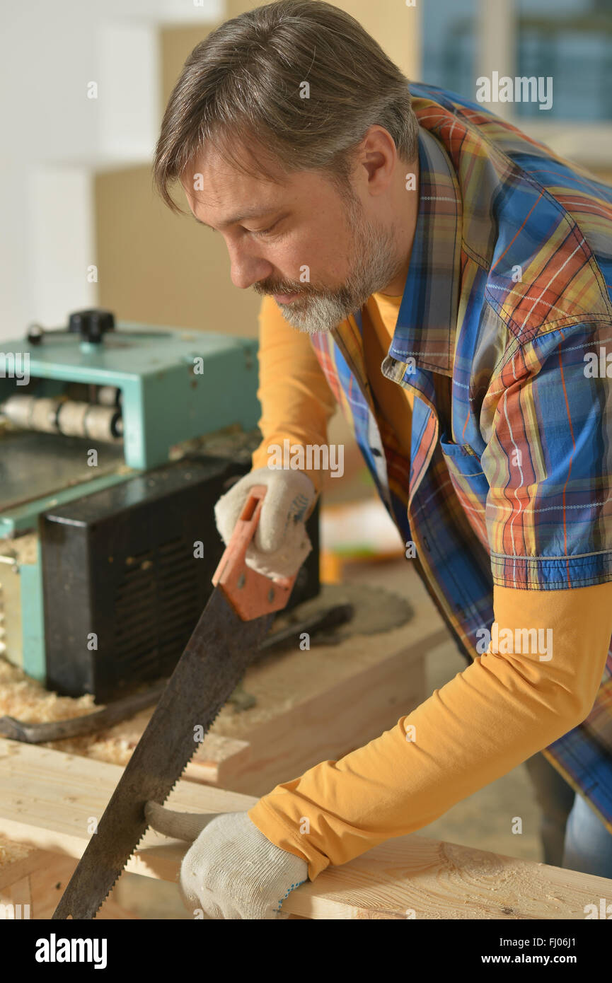 man repairing in the room Stock Photo - Alamy