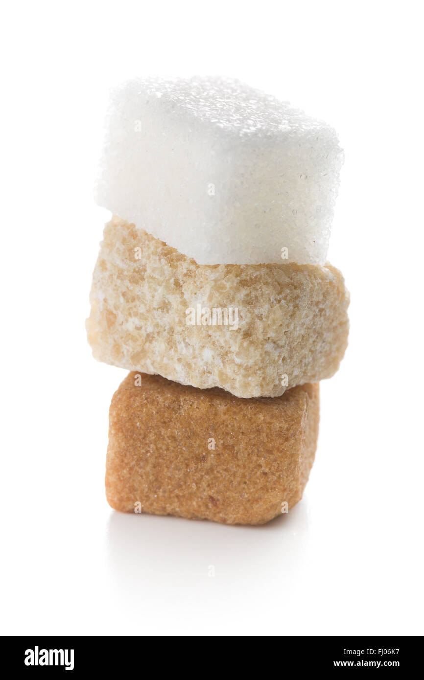 three different sugar cubes on white background Stock Photo - Alamy