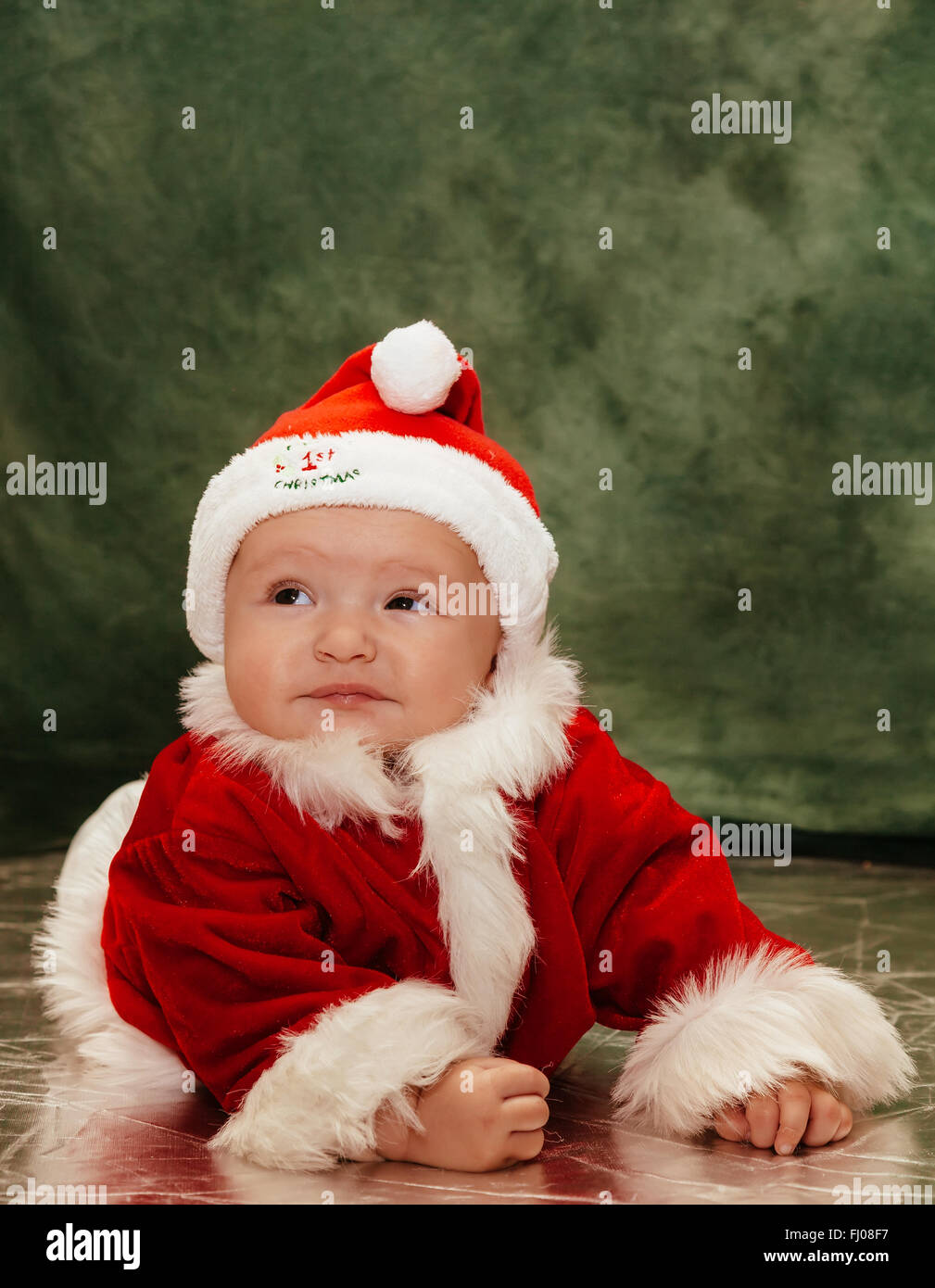 Beautiful child christmas holiday red baby Stock Photo - Alamy