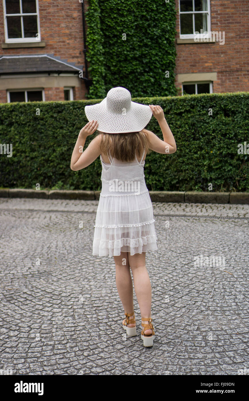 Woman walking home alone hi-res stock photography and images - Alamy