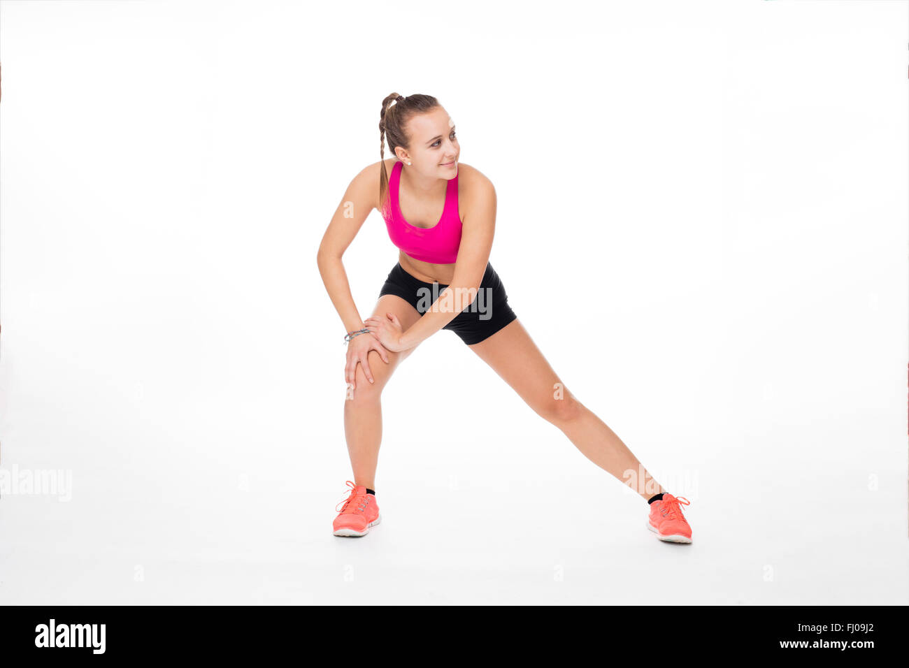Teenage girl preparing for training Stock Photo - Alamy