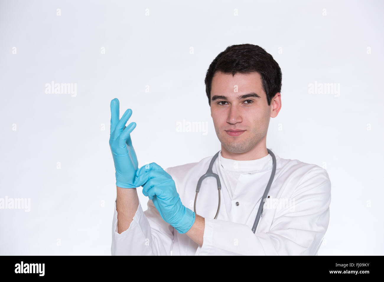 Male doctor blue protective gloves hi-res stock photography and images ...