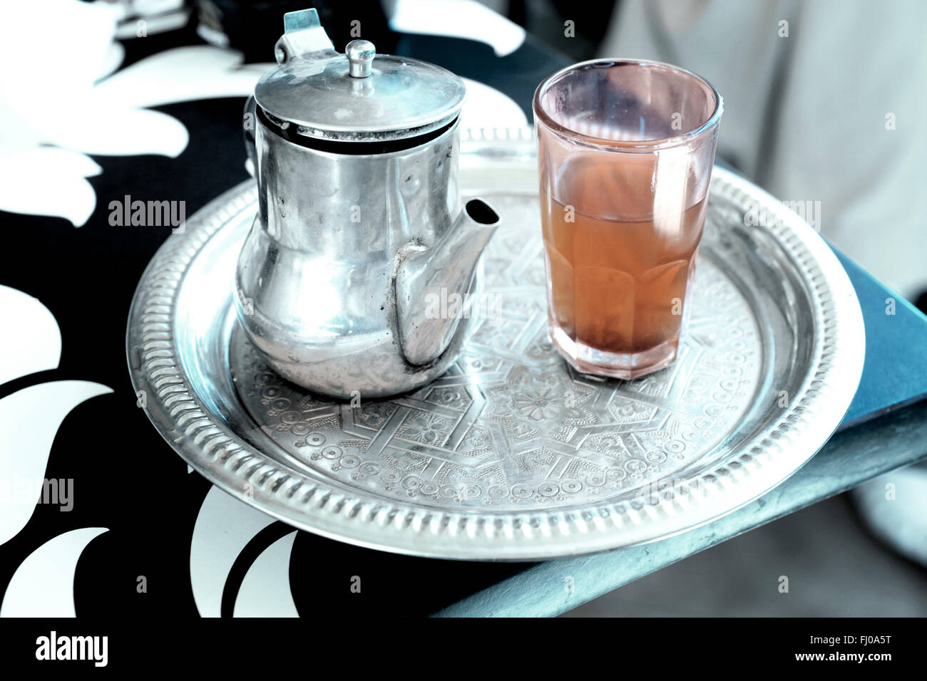 Traditional Turkish tea served on a silver ware Stock Photo - Alamy