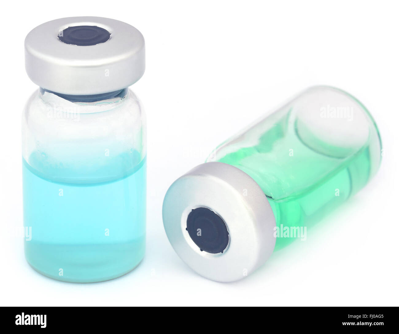 Closeup of Vials over white background Stock Photo - Alamy