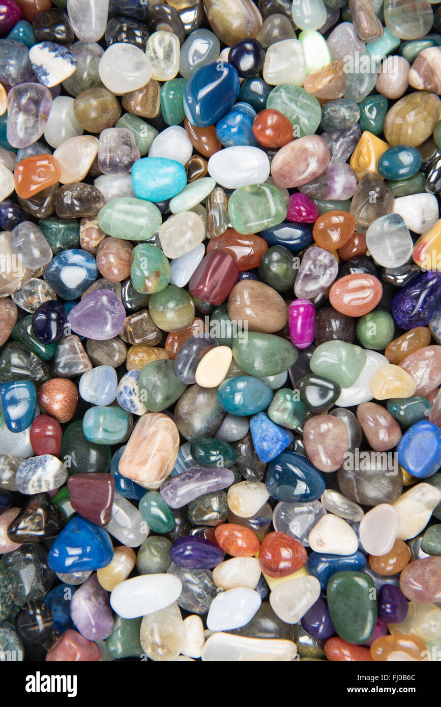 Semi-precious gem stones background Stock Photo - Alamy