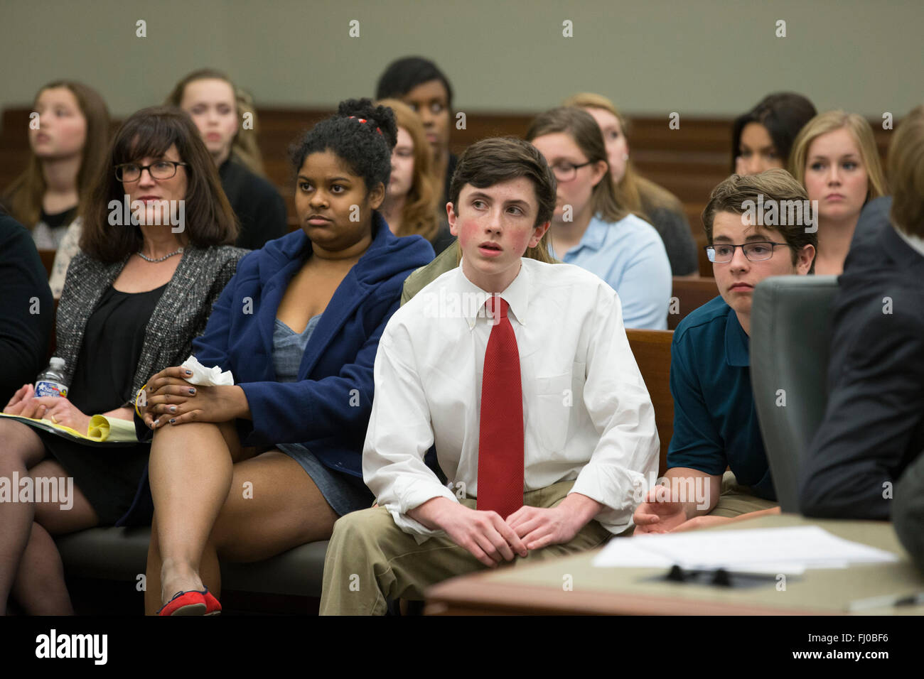 Teens listen to proceedings in county courtroom during mock trial for ...
