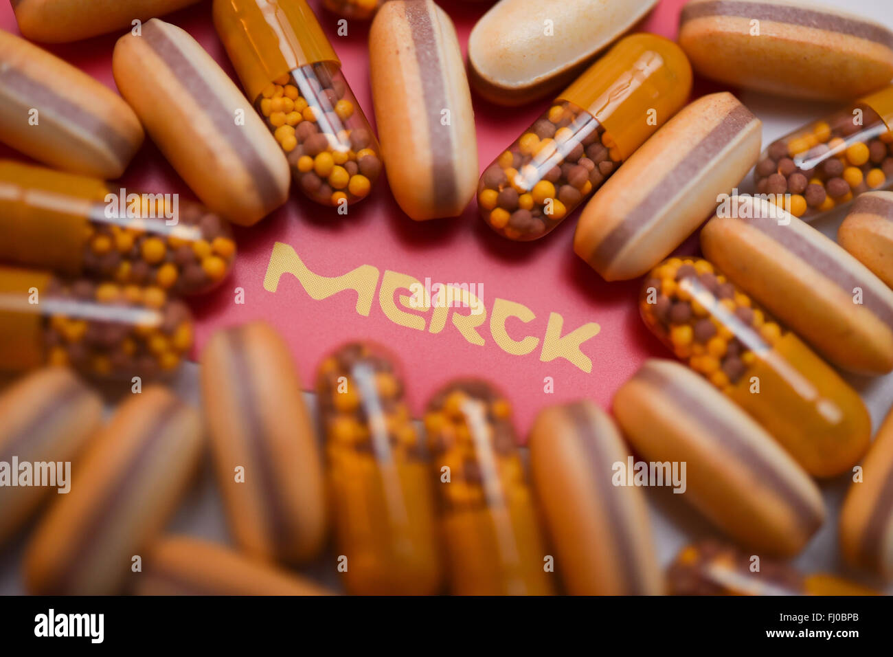 ILLUSTRATION - Nutritional supplement tablets have been placed around a ...