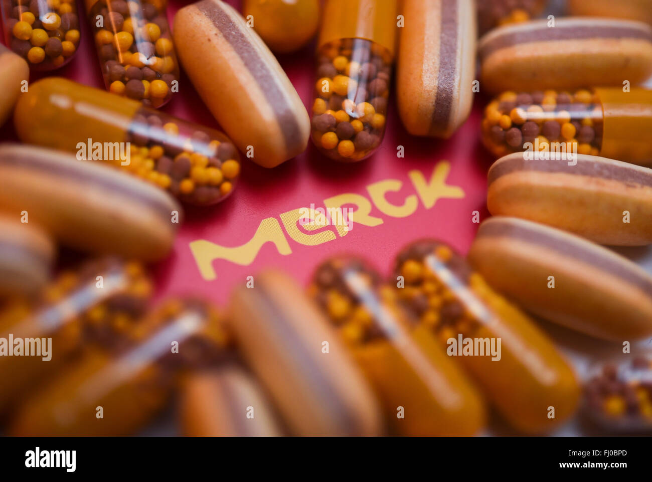 ILLUSTRATION - Nutritional supplement tablets have been placed around a ...