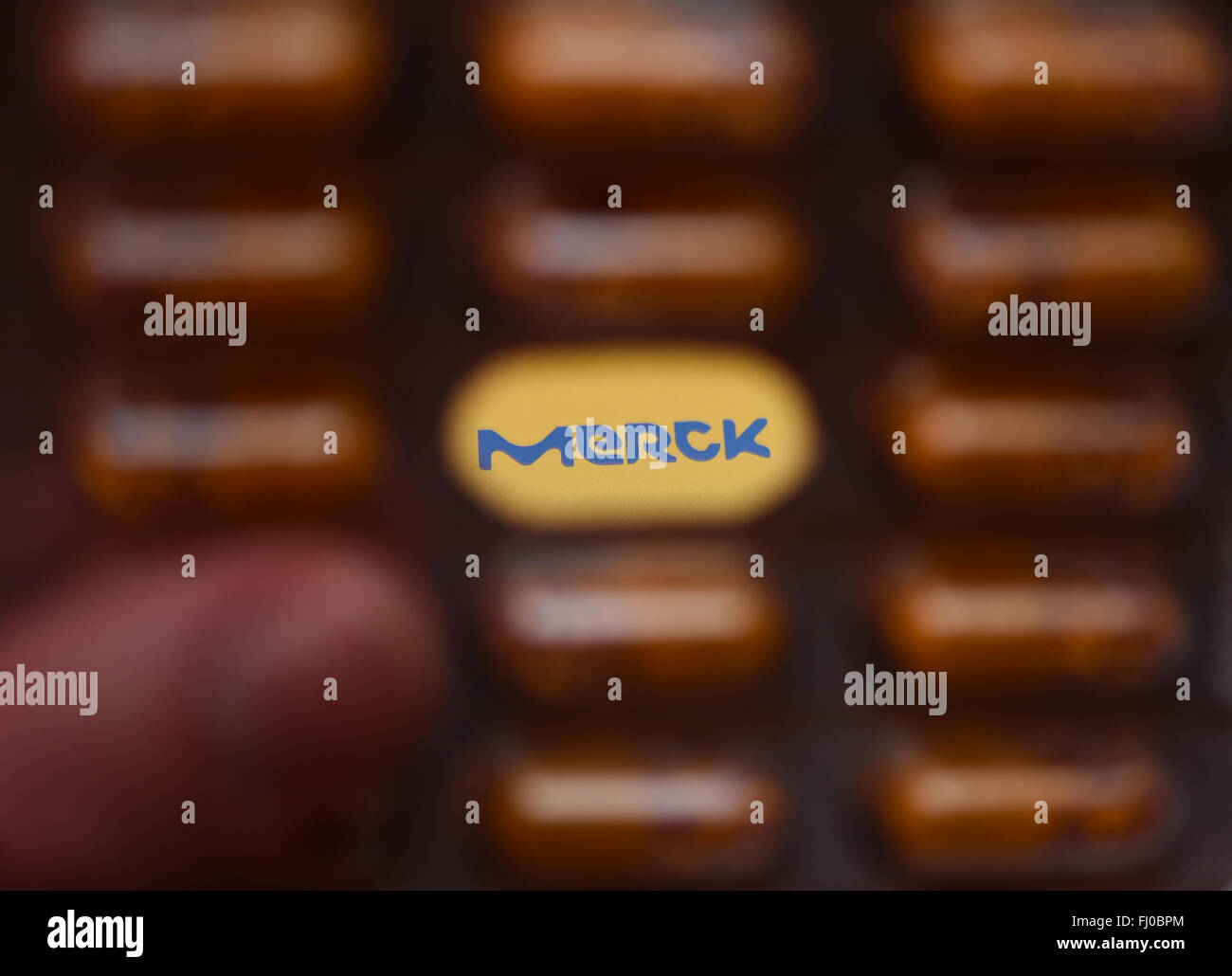 ILLUSTRATION - A Merck logo featuring its new corporate design seen ...