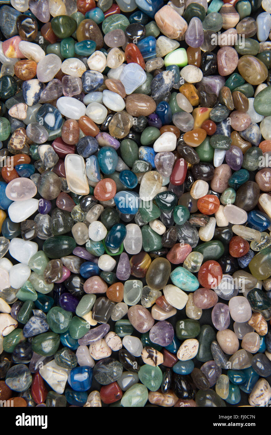 Semi-precious gem stones background Stock Photo - Alamy