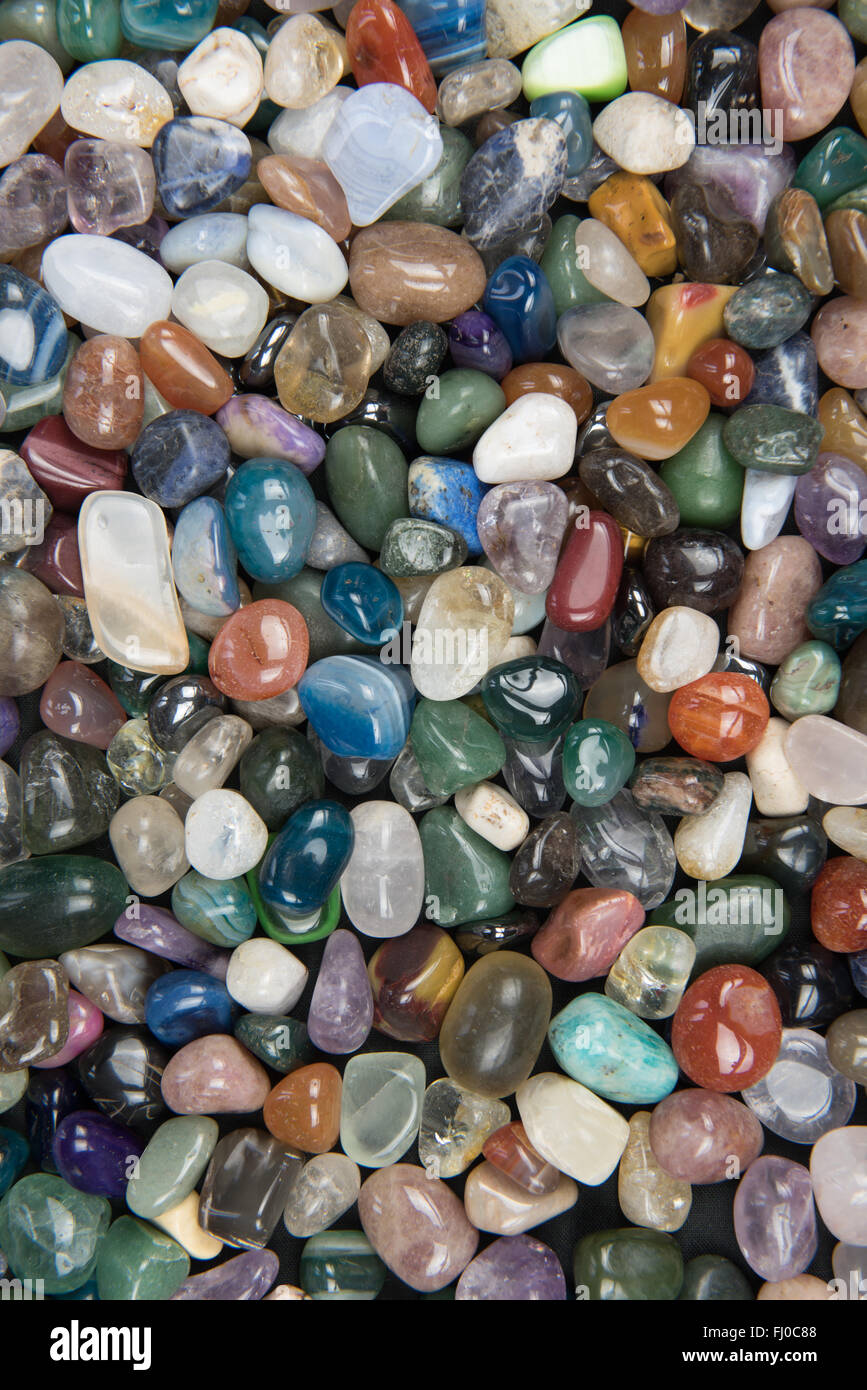 Semi-precious gem stones background Stock Photo - Alamy