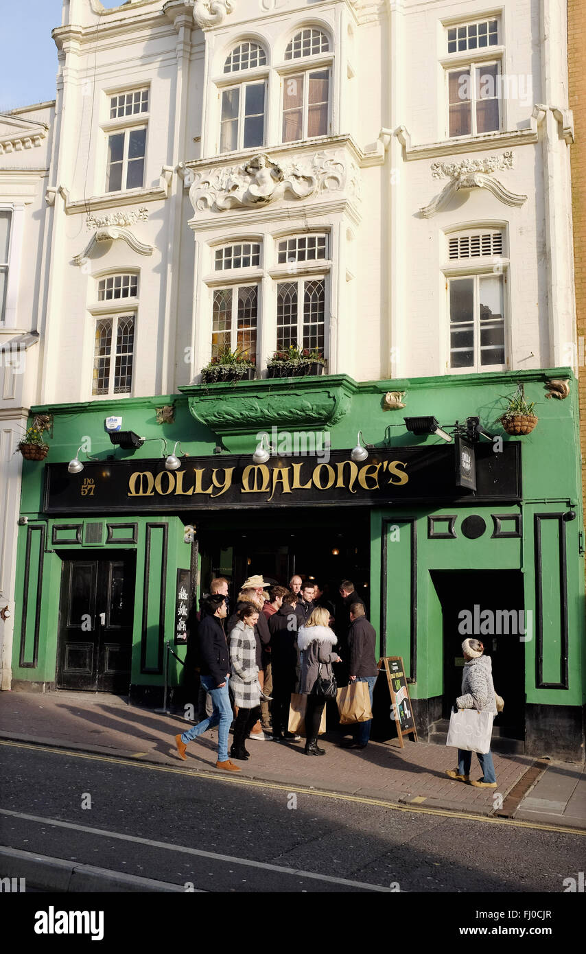 Molly Malone's Irish Pub in West Street Brighton with people drinking ...