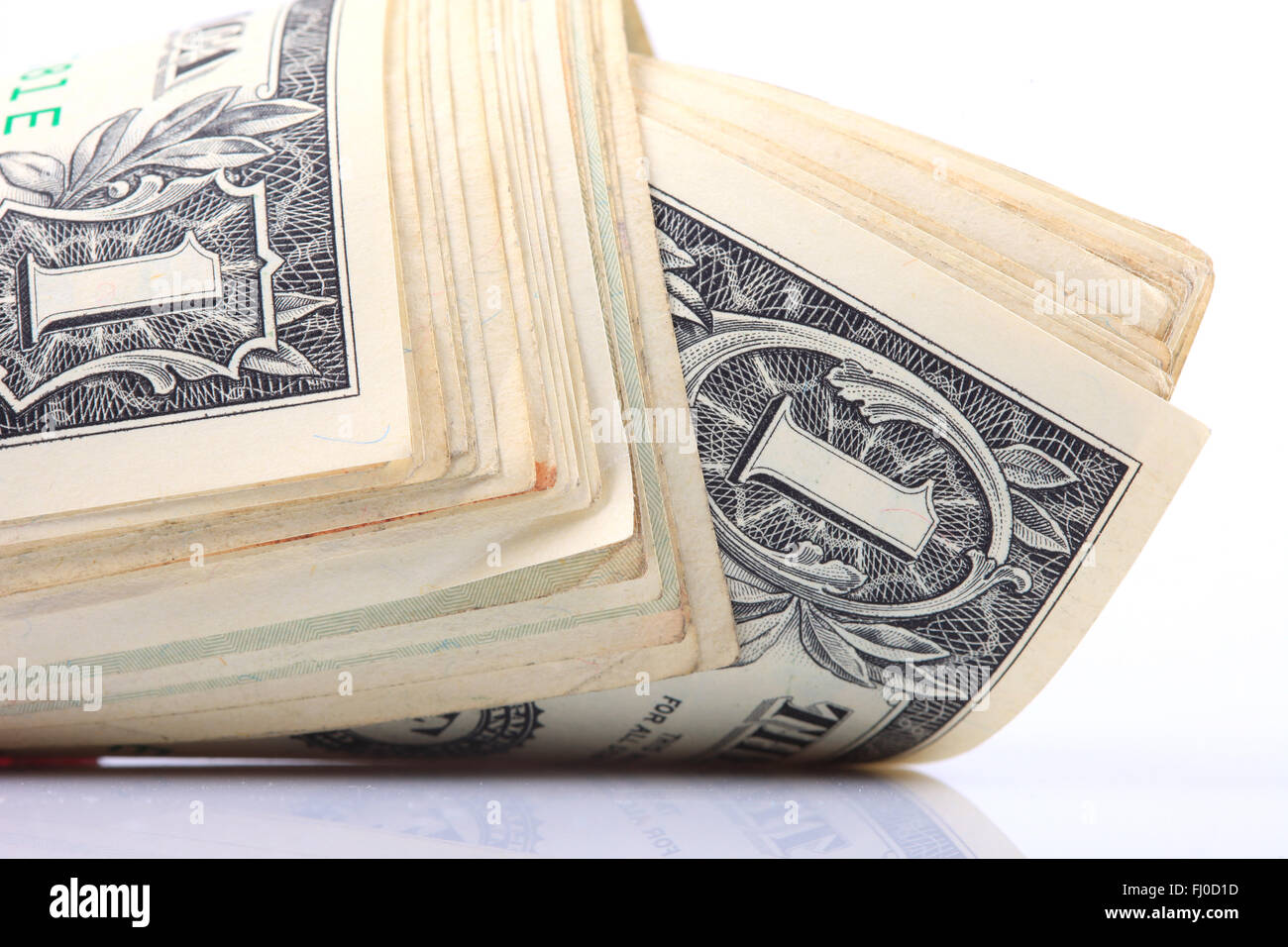 stack of dollars on white background Stock Photo - Alamy