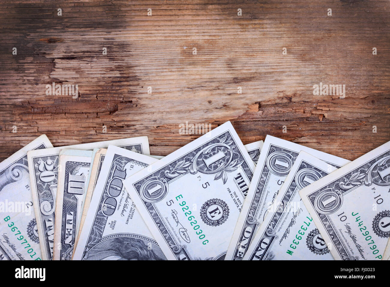 Top view banknotes on old wooden table with copy space Stock Photo - Alamy