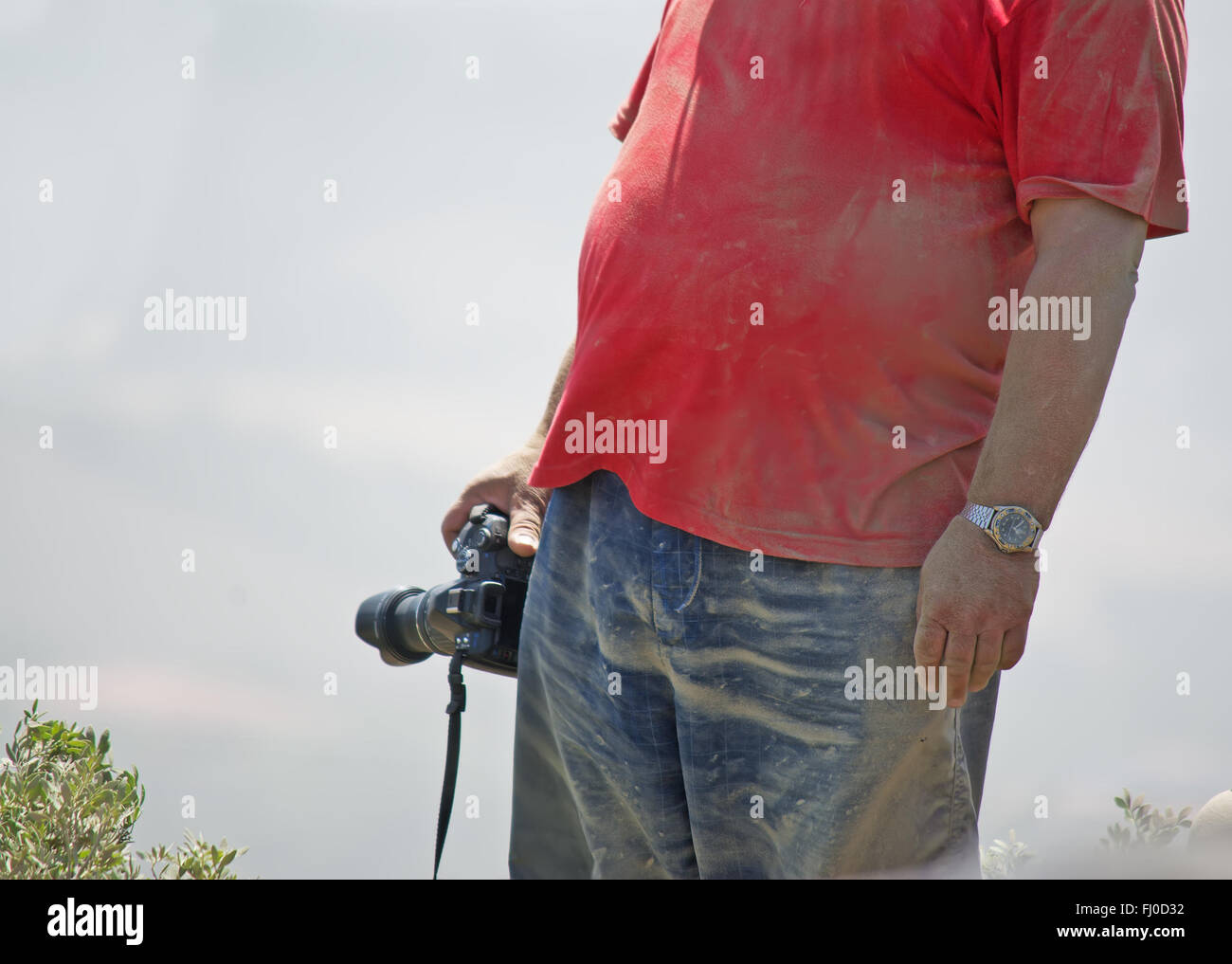 photographer covered by dust and mud Stock Photo - Alamy