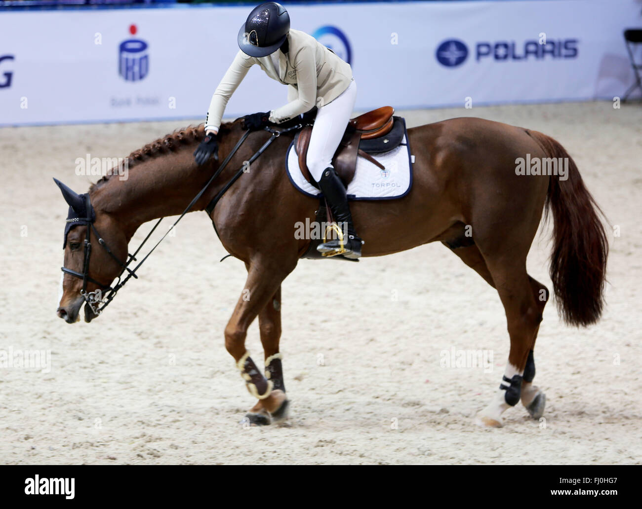 Warsaw, Poland. 25th Feb, 2016. Polish rider, Paulina Koza, pats her ...