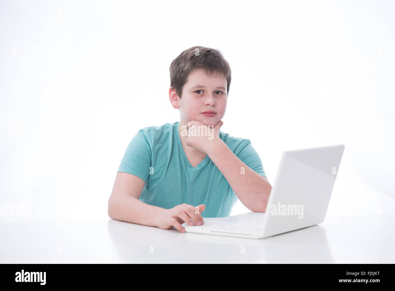 young boy working with laptop Stock Photo - Alamy