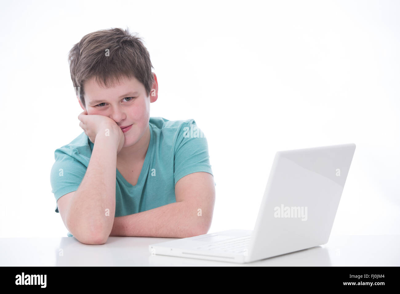 young boy working with laptop Stock Photo - Alamy