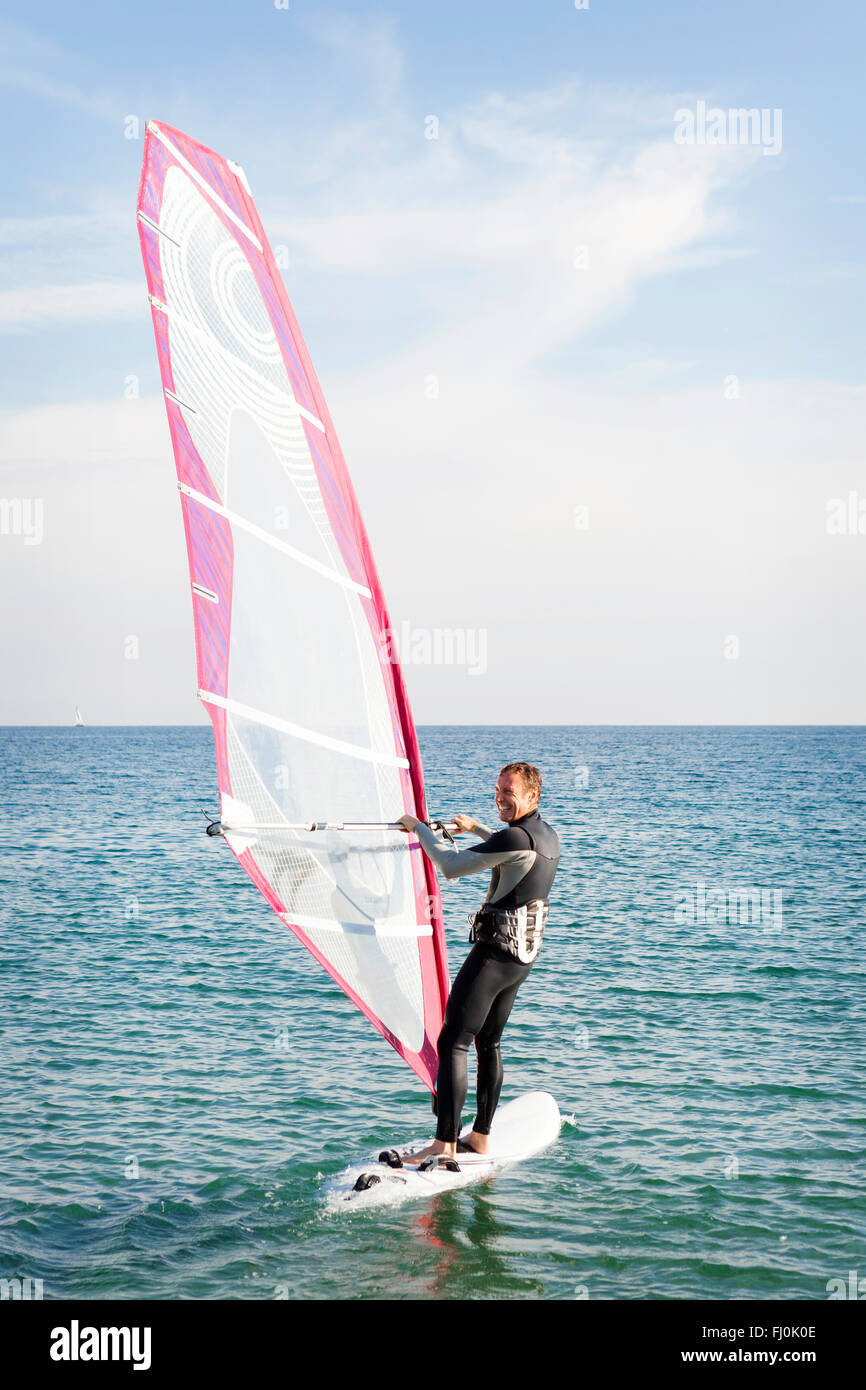 Man windsurfing on the sea Stock Photo - Alamy