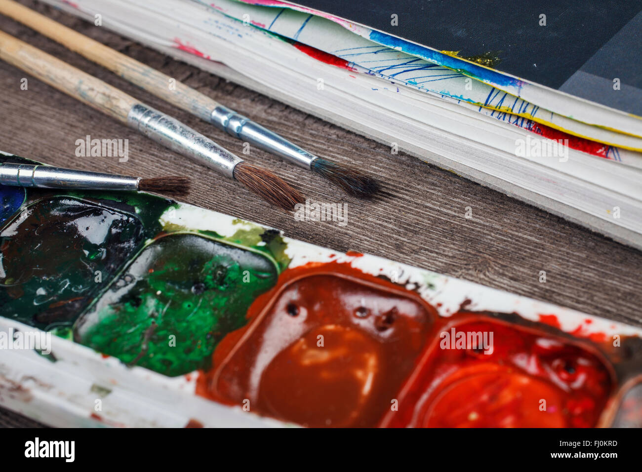 Paints and brushes Stock Photo - Alamy