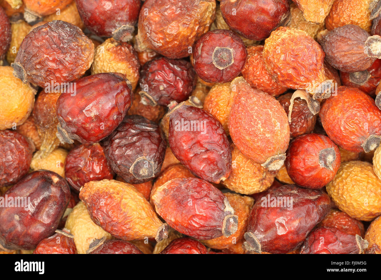 Food background - dried rose hips Stock Photo - Alamy