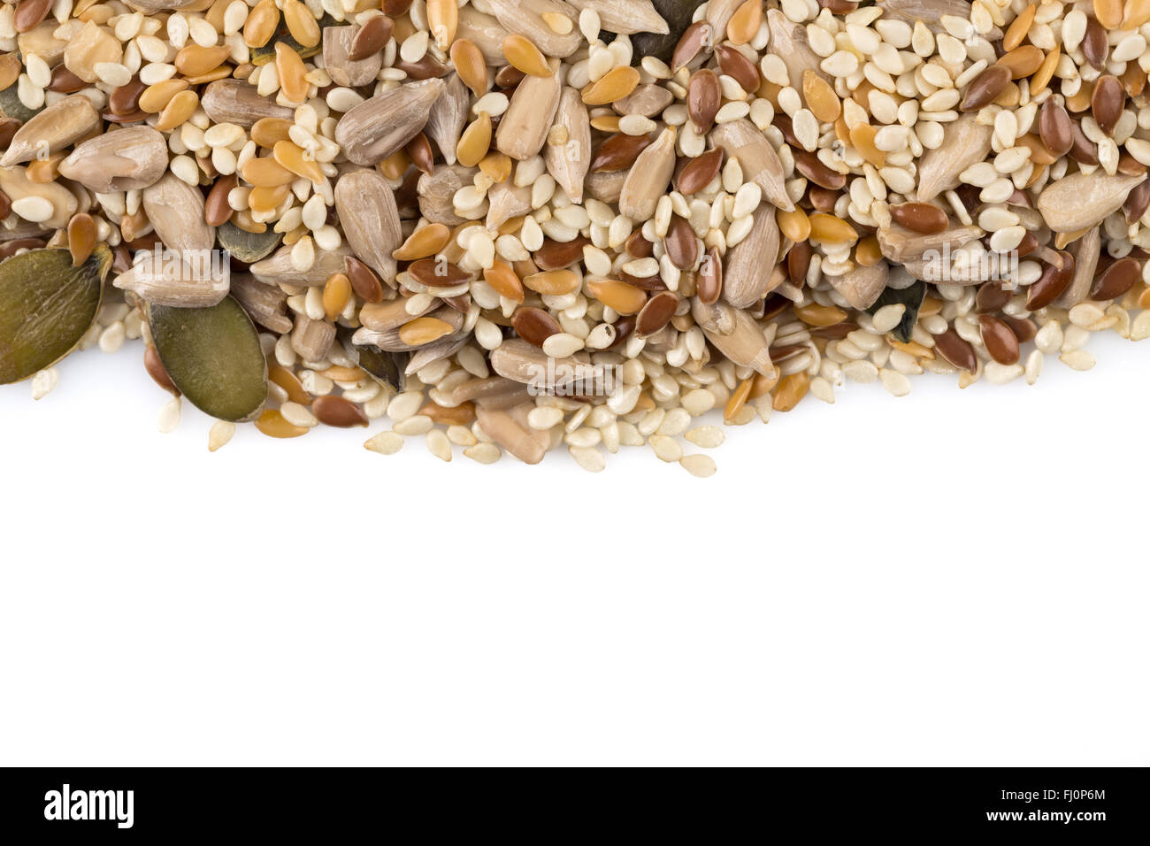 Healthy seeds mix close up shot on white background Stock Photo - Alamy