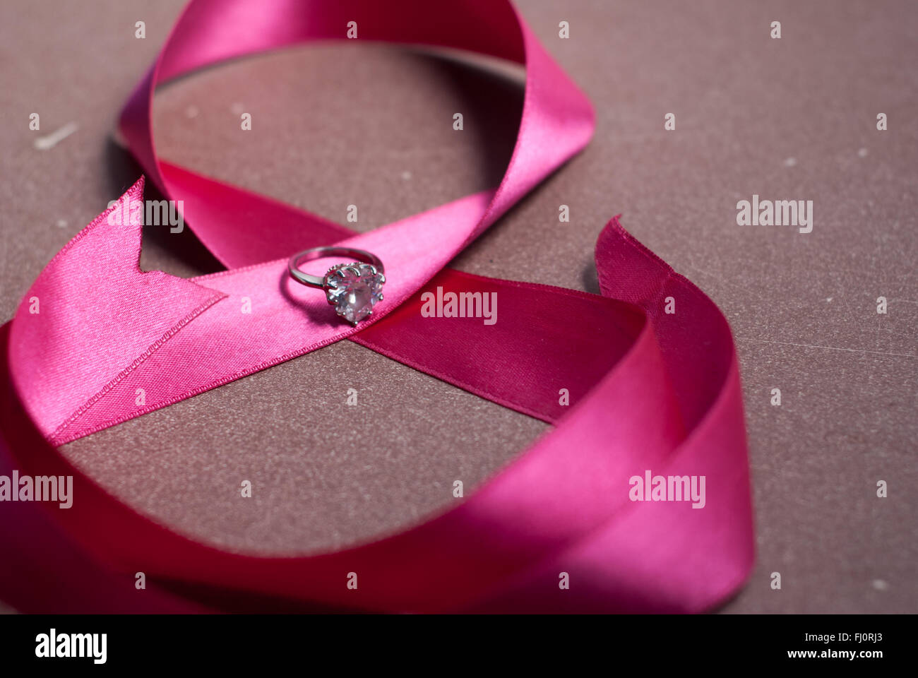 Beautiful ribbon with ring Stock Photo - Alamy