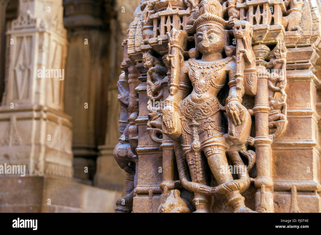 Hindu Statue Carved into a Sandstone Temple in Jaipur, India Stock ...