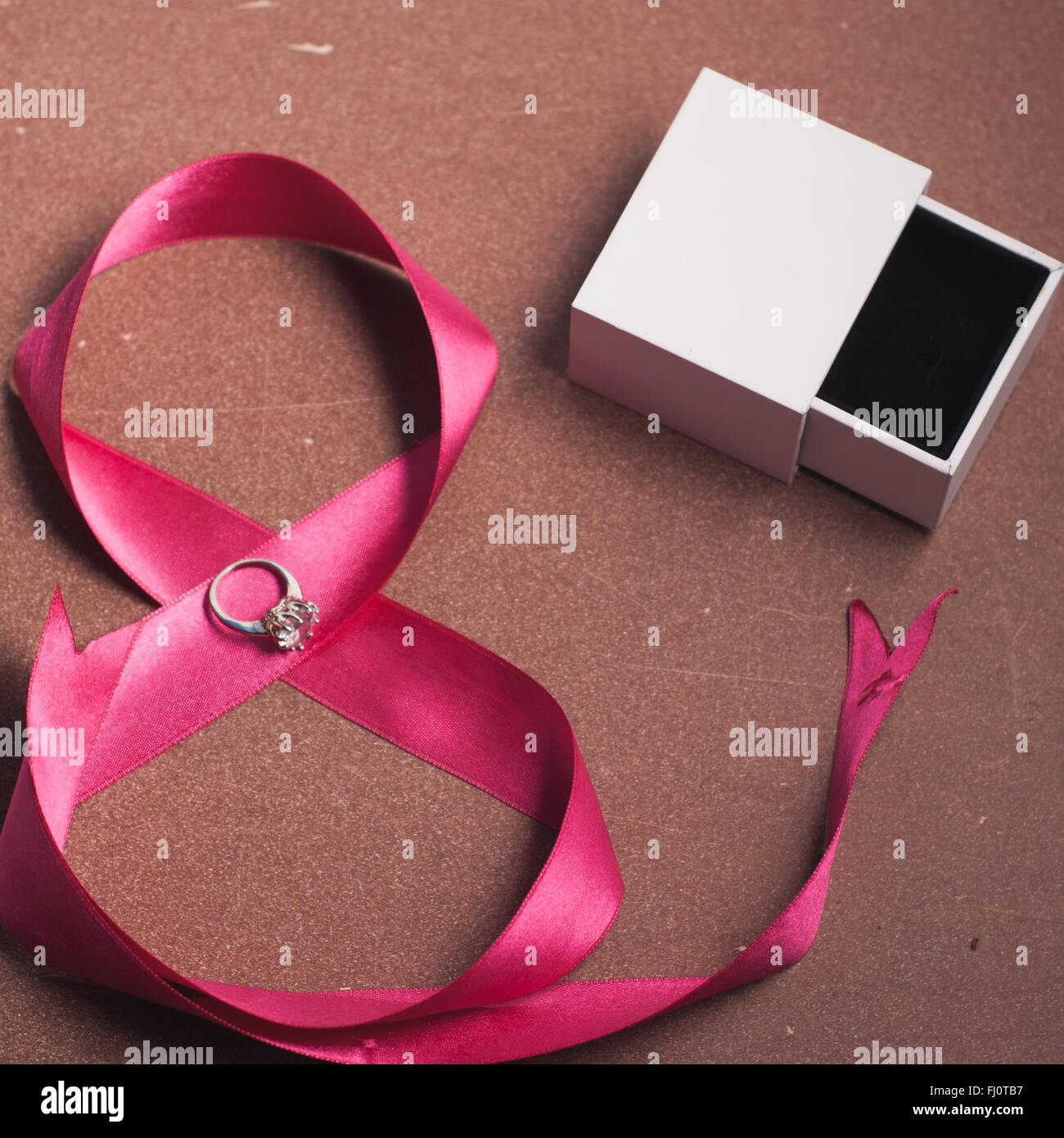 Beautiful ribbon with ring Stock Photo - Alamy