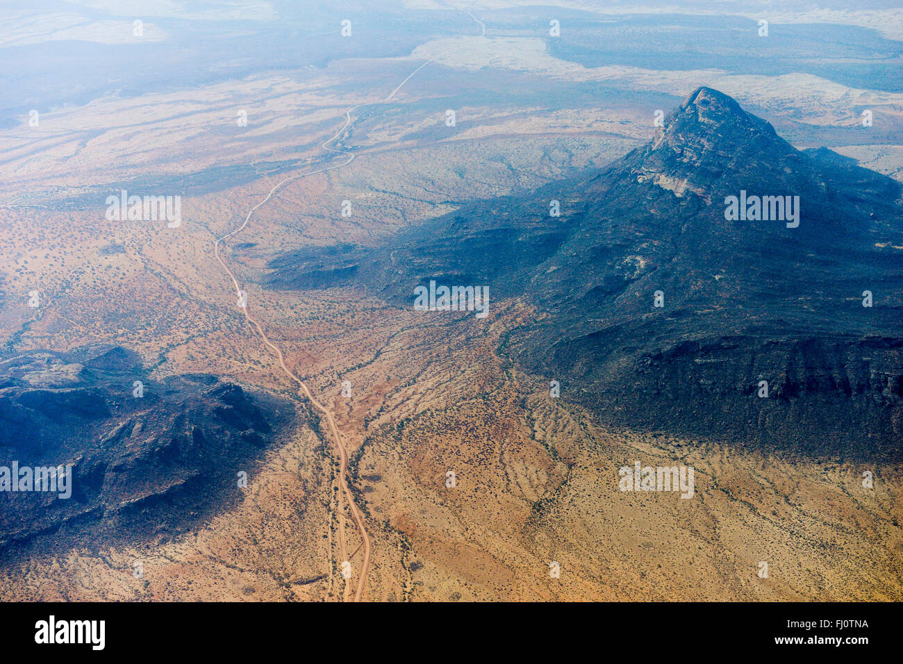 KENYA, Marsabit, aerial view of savanna and new road from Laisamis to ...