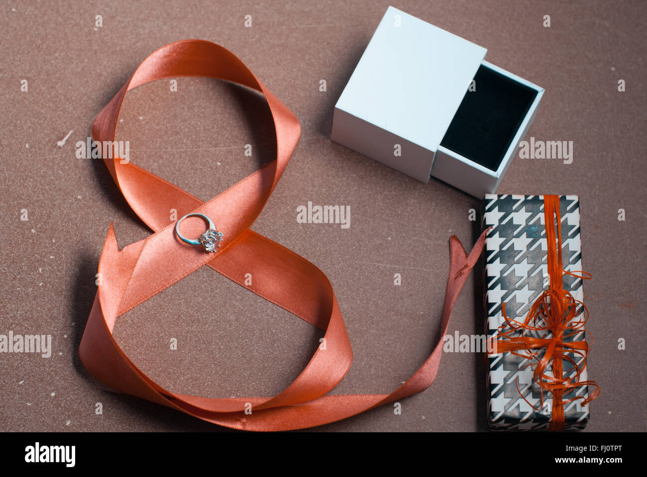 Beautiful ribbon with ring Stock Photo - Alamy