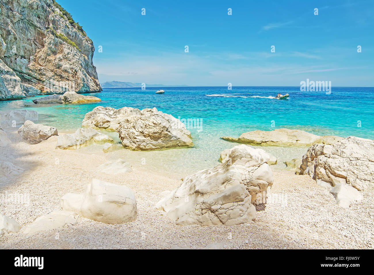 white sand, turquoise sea and rocks in Cala Mariolu, Sardinia Stock ...