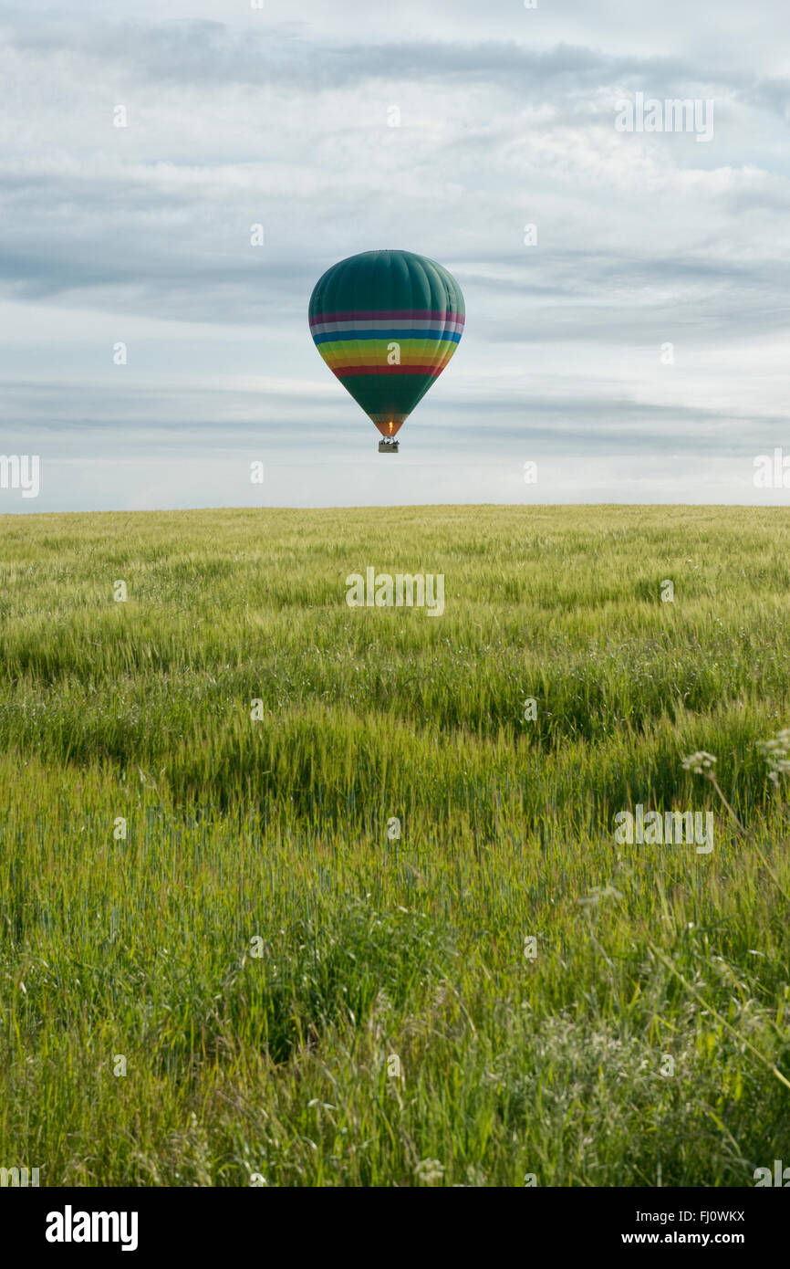 Low flying colourful balloon. Scottish Borders, Scotland Stock Photo ...