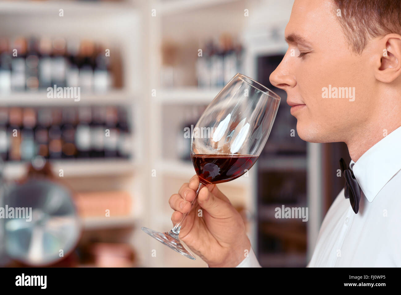 Professional sommelier tasting wine Stock Photo - Alamy