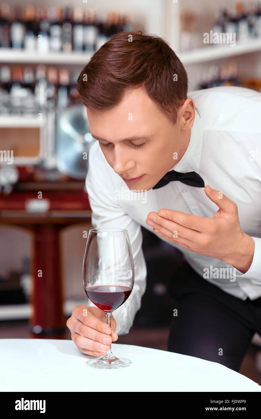 Professional sommelier tasting wine Stock Photo - Alamy