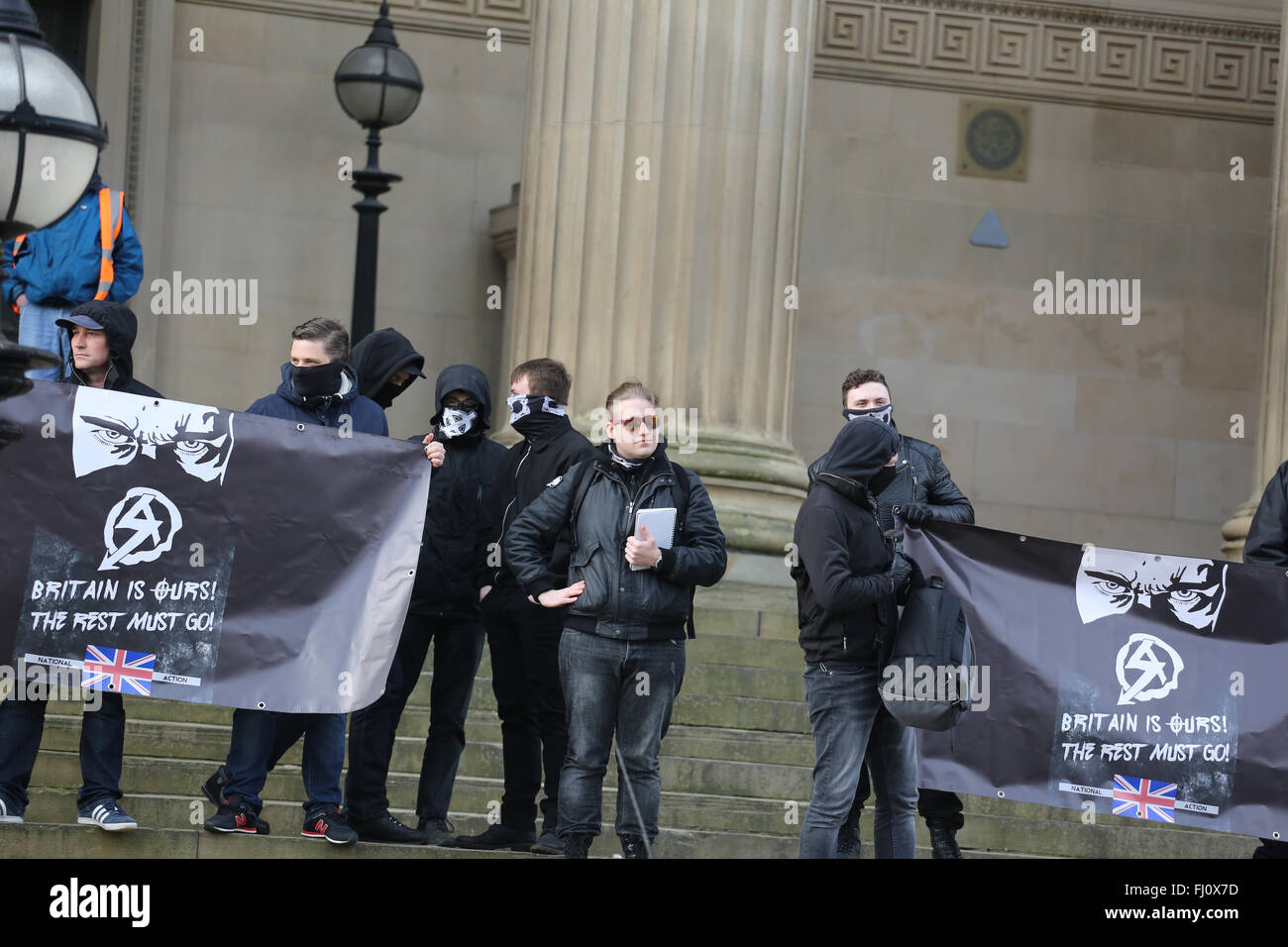 Liverpool, UK. 27th Feb, 2016. Right wing nationalists stood with ...