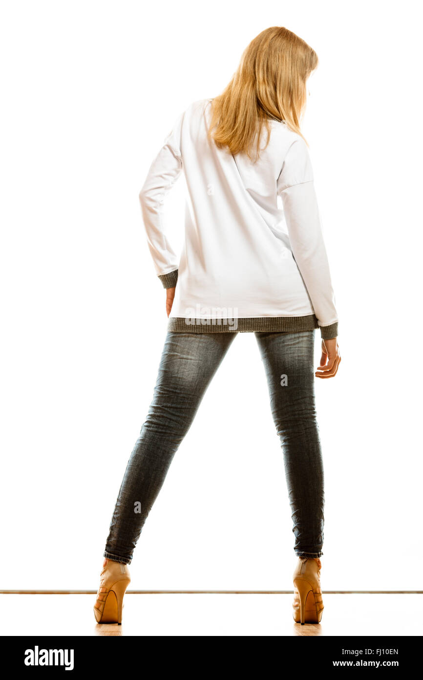 Fashion and people concept. Woman full length in denim trousers high ...