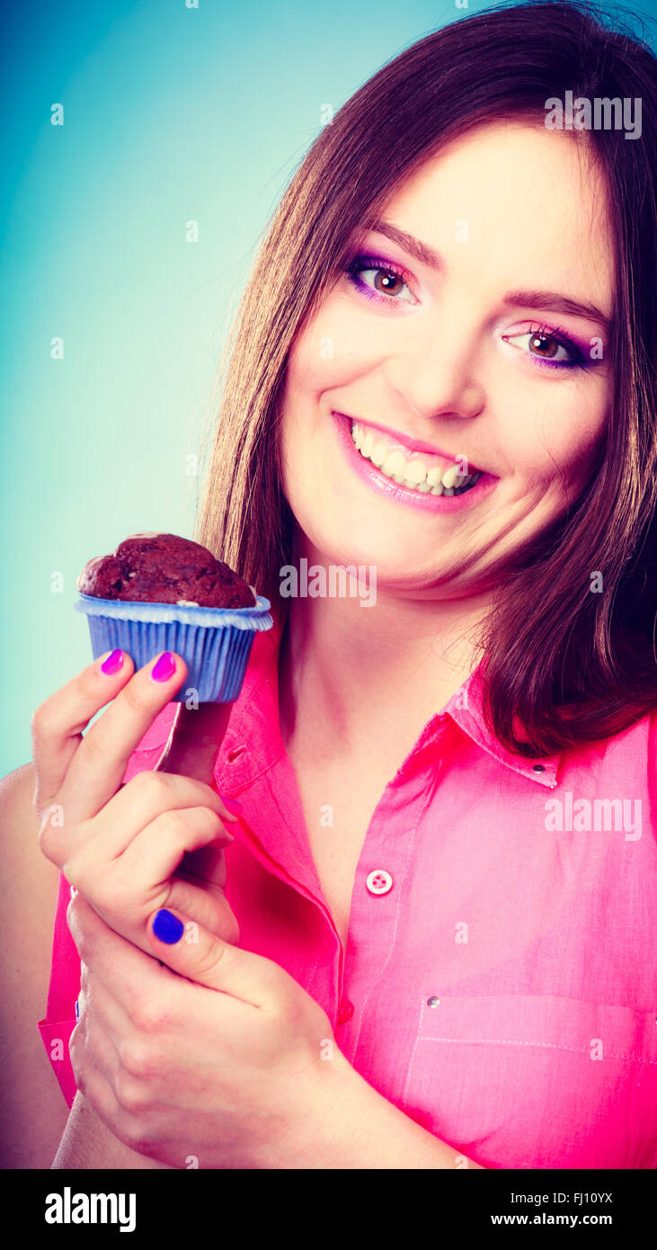 Sweet food sugar make us happy. Smiling woman holds cake chocolate ...