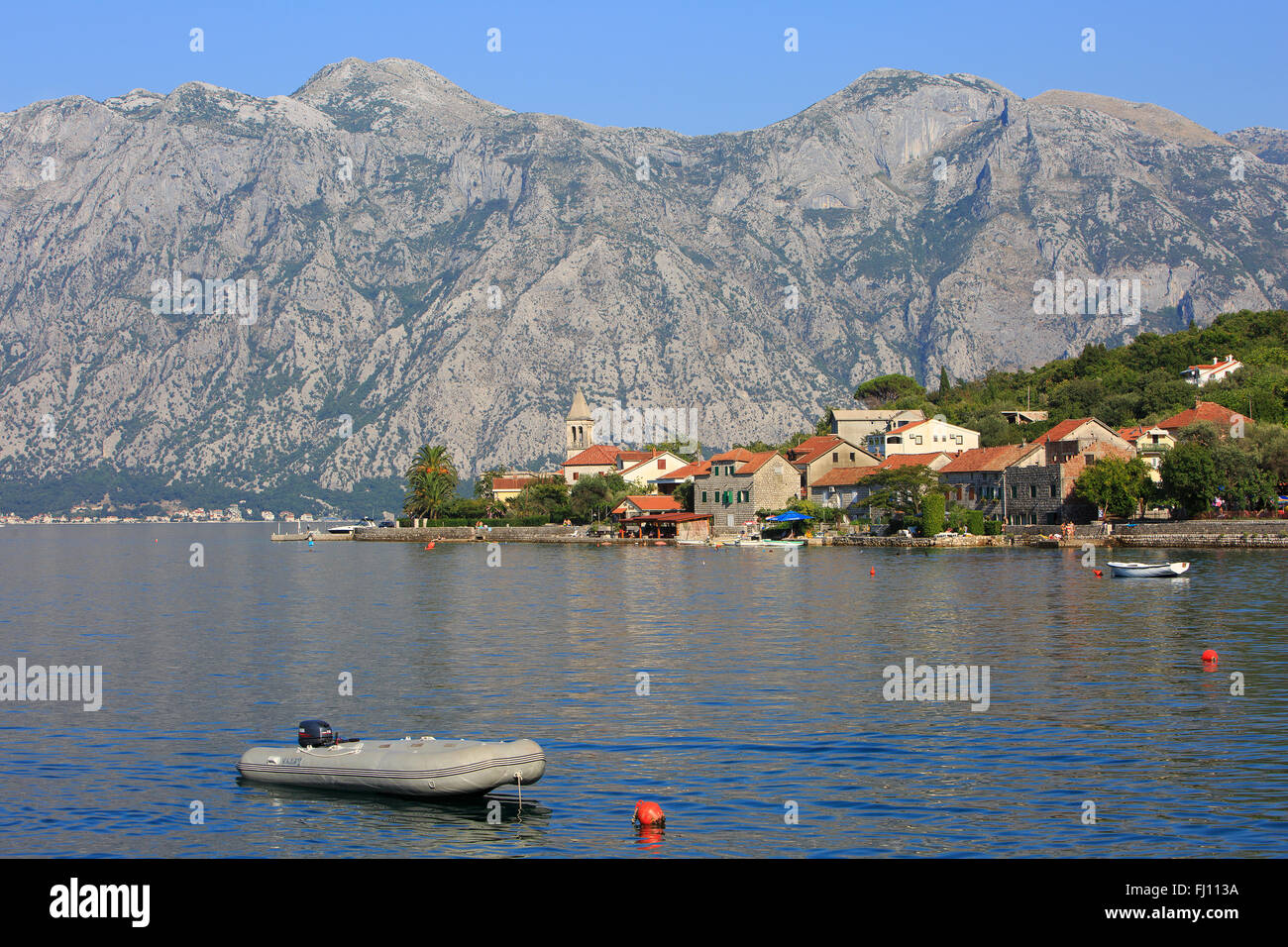 Panoramic view of the picturesque village of Prcanj along the Bay of ...