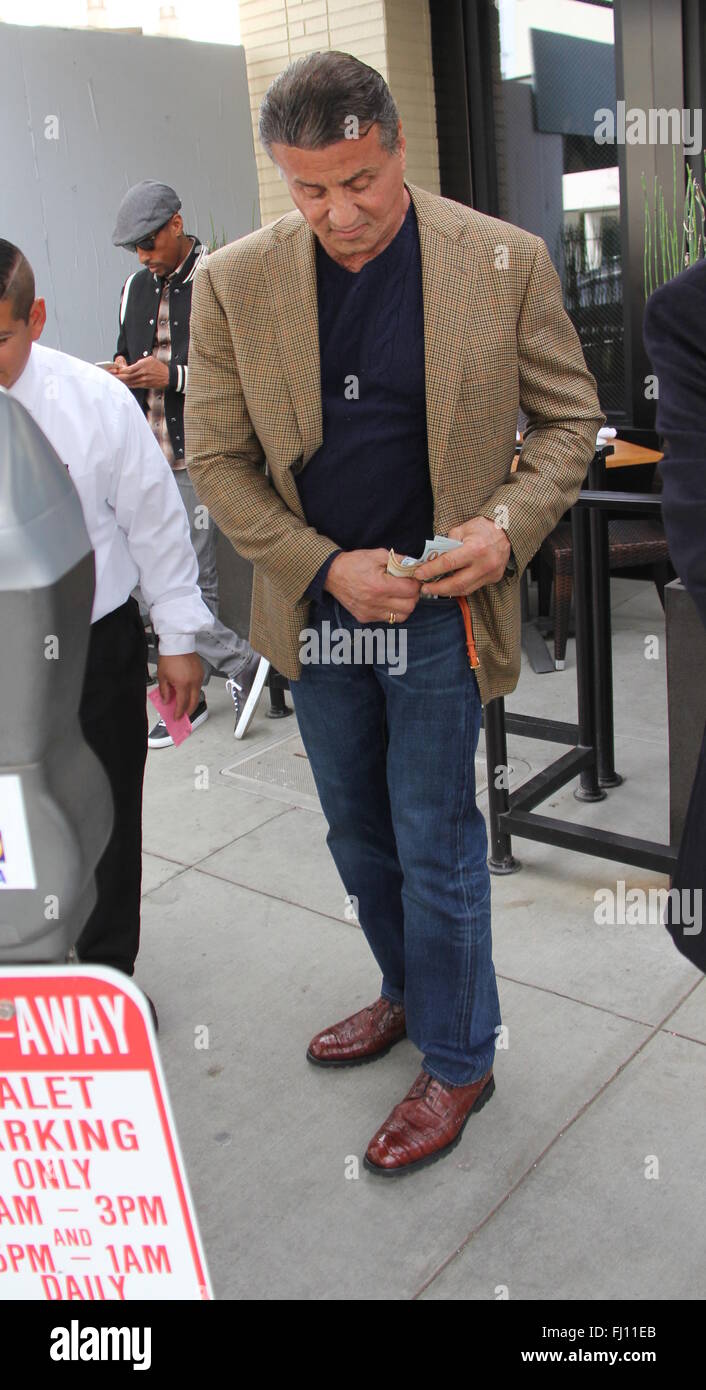 Sylvester Stallone at lunch at the Palm with $100 bills and wearing ...