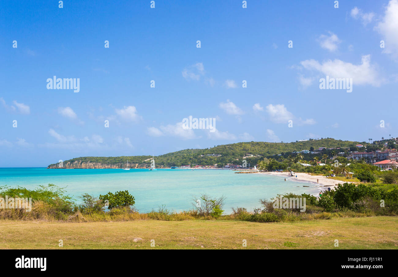 View of the unspoilt and popular sweeping Dickenson Bay beach in north ...