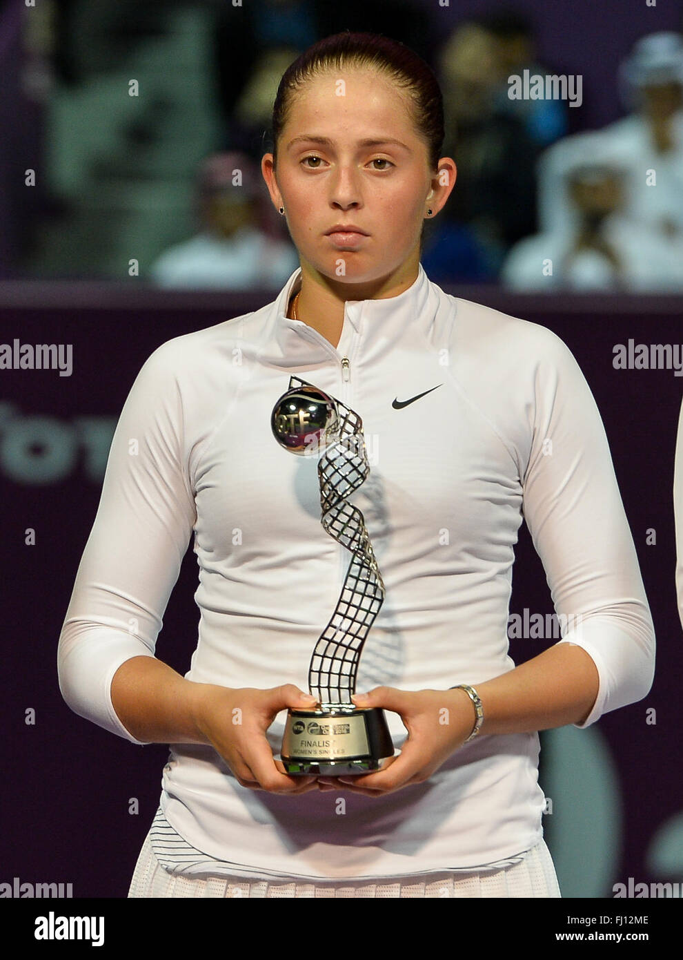Doha. 27th Feb, 2016. Jelena Ostapenko of Latvia poses with her runner ...