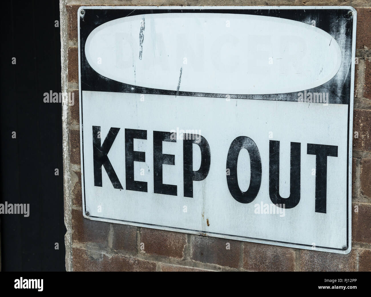 Warning sign in abandoned industrial buildings on Cockatoo Island near ...