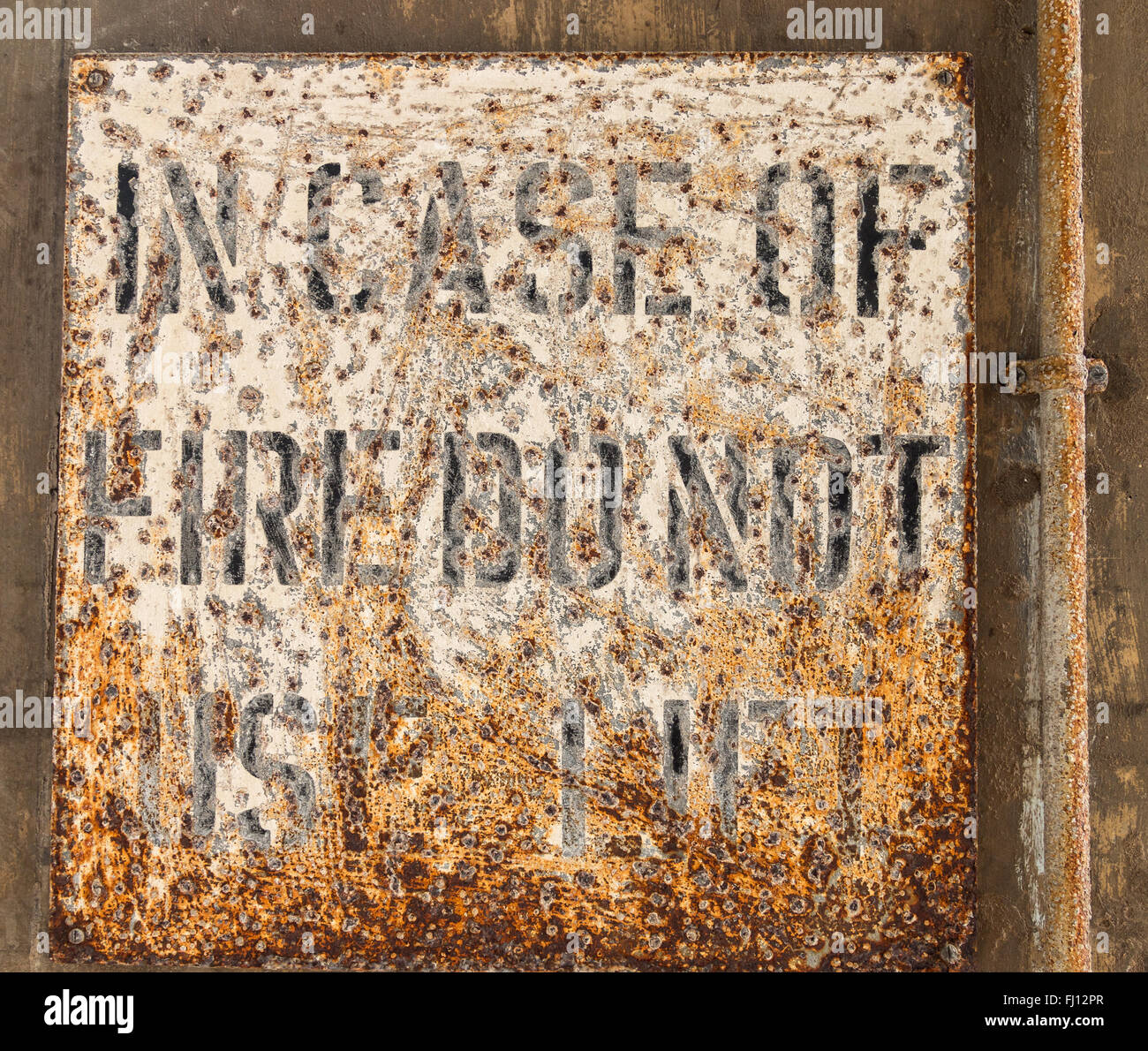 Warning sign in abandoned industrial buildings on Cockatoo Island near ...